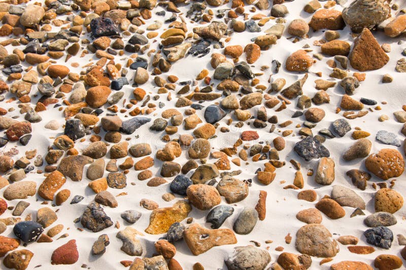 Smooth Round Pebble Stones on the Sand Beach Backgound Stock Image ...