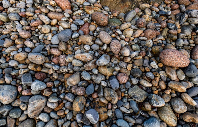 Smooth Round Rocks Background Stock Photo - Image of path, exposure ...