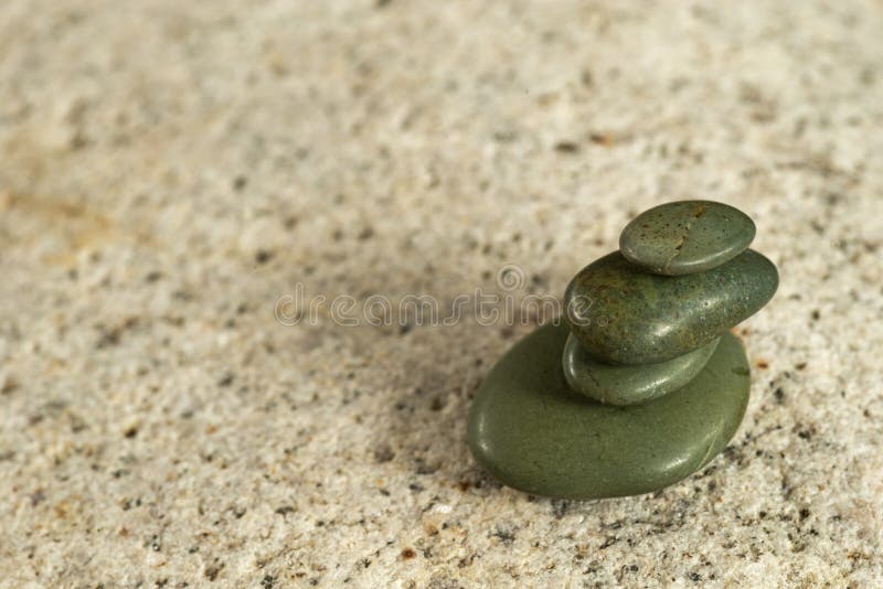 Smooth Stacked Little Jade Pebbles on Granite Stock Photo - Image of ...