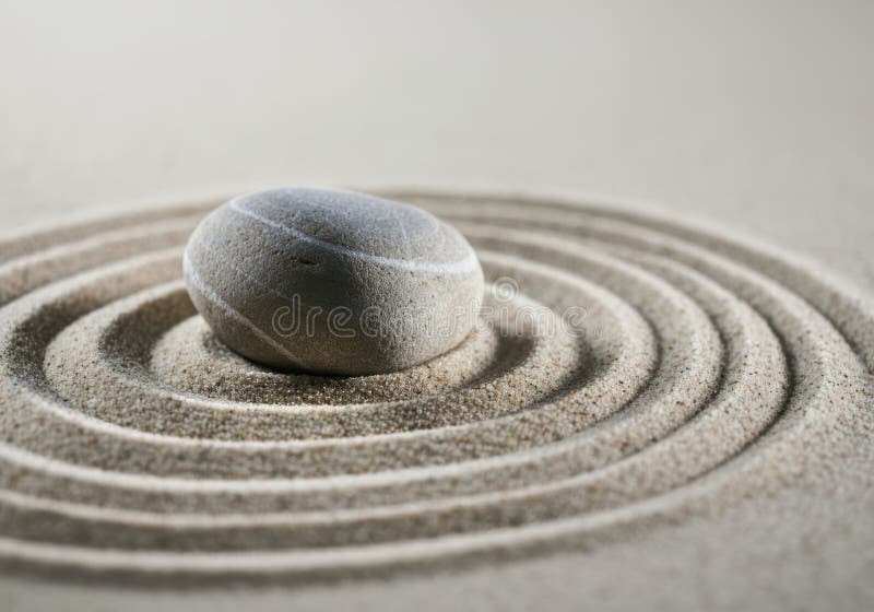 Smooth Stone Resting on a Bed of Sand, Creating Calming Ripples Stock ...