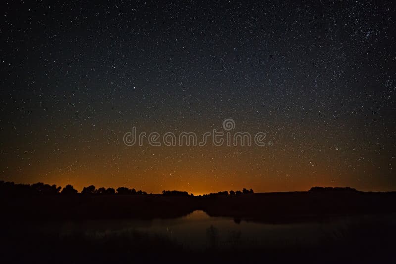 Smooth Surface of the Lake on Background the Starry Sky Stock Photo ...