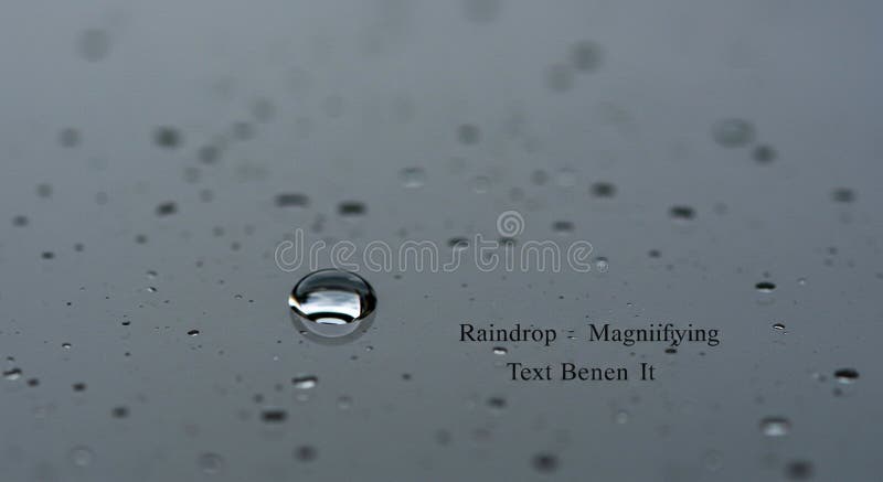 A Smooth Surface with Scattered Raindrops is Shown, Most Notably a ...