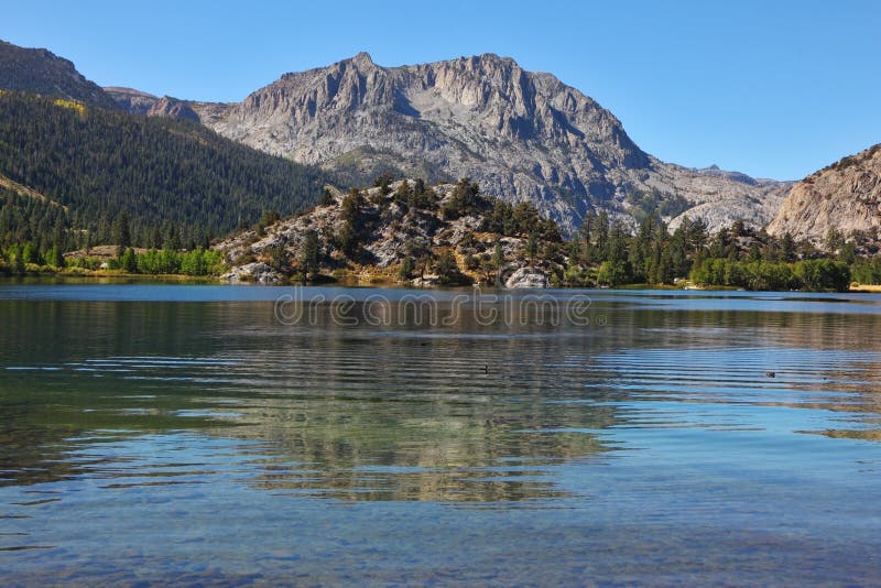 The Smooth Water of a Picturesque Lake Stock Image - Image of ...