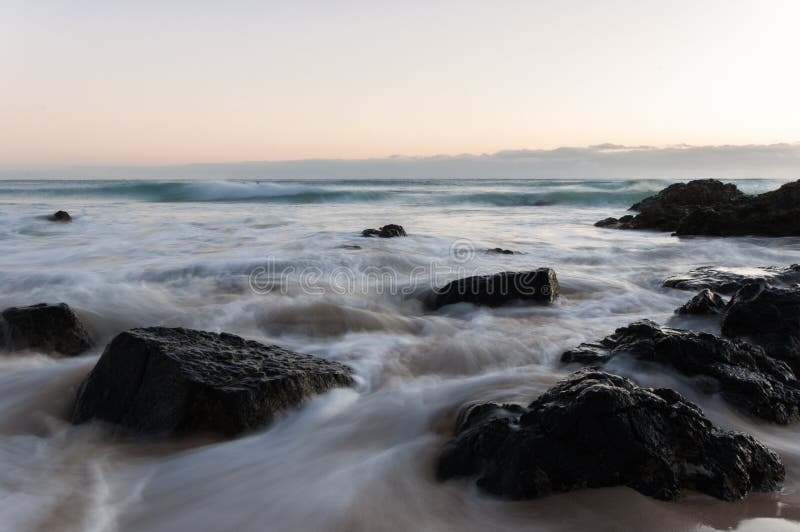 Smooth Water Running Over Rocks Stock Image - Image of island, blurred ...