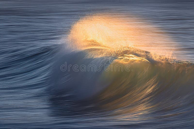 Smooth Breaking Hollow Green Ocean Wave with Clouds at Sunrise Stock ...