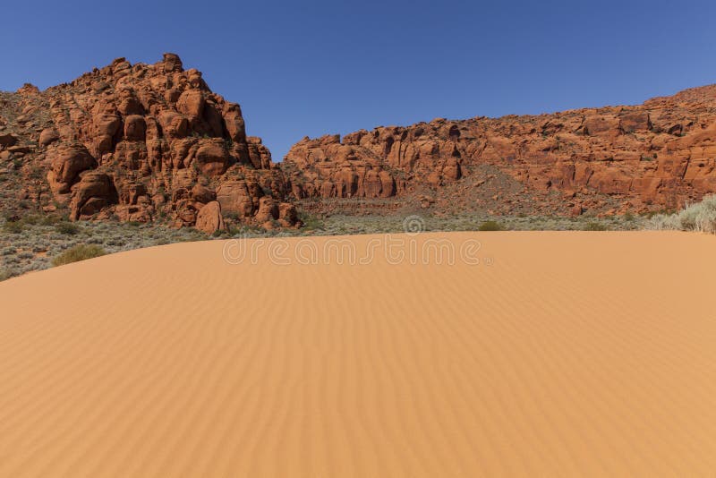 Smooth Wind Ridges in Sand Dunes and Red Rocks Mountains. Stock Photo ...