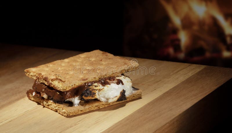 Smore Cooling on a Wood Table Stock Image - Image of warm, burnt: 256229675