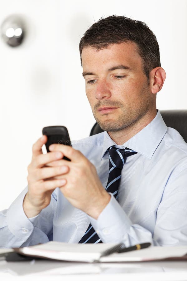 Smiling Man Texting on Mobile Phone Stock Image - Image of good, face ...
