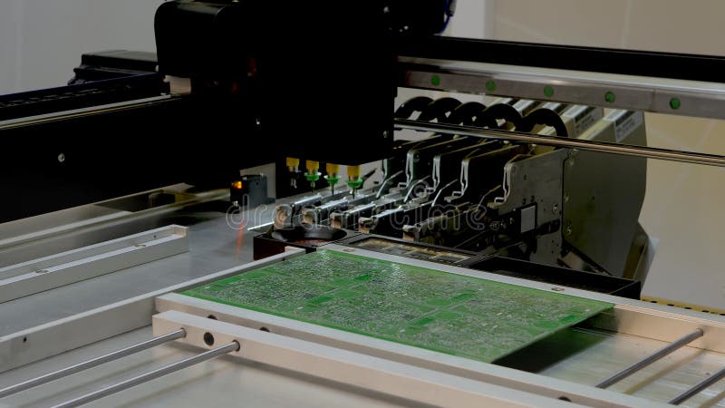 SMT Pick and Place Machine Installing SMD Electronic Components at ...