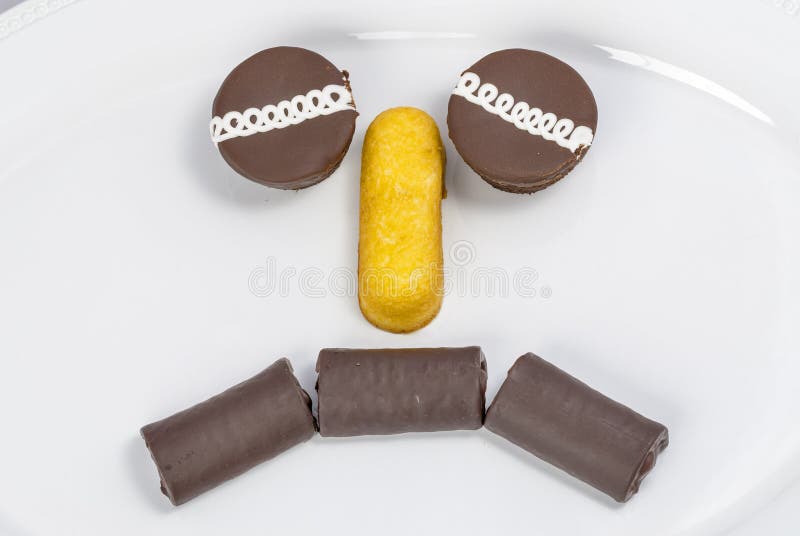 Snack Cakes in the Shape of a Sad Face Stock Photo - Image of food ...