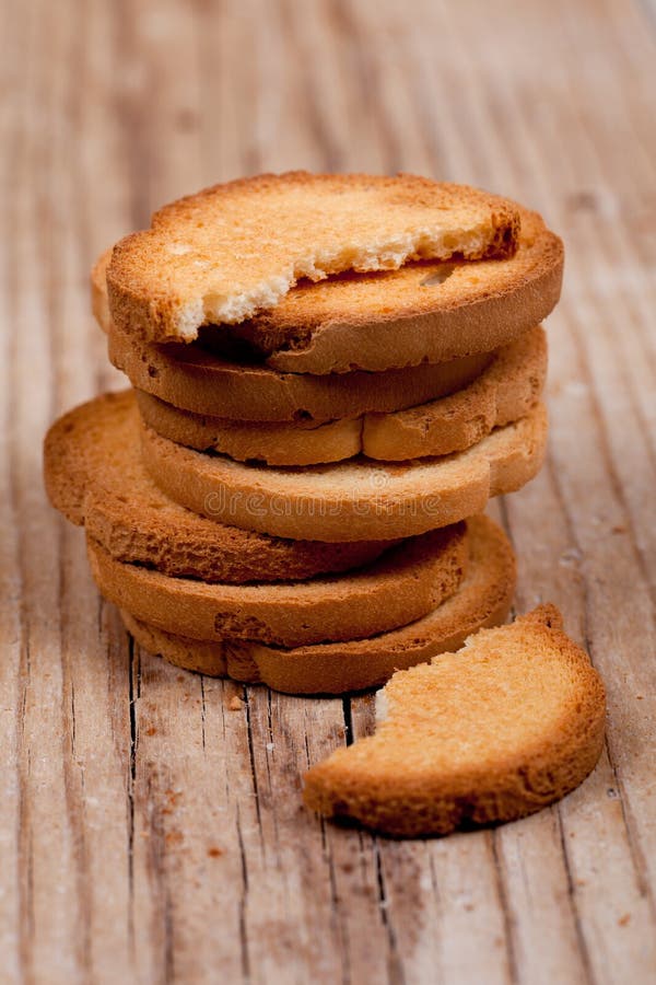 Crackers Stack Together on Black Stone, Coarse Sugar on Wooden B Stock ...