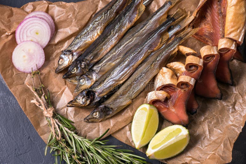 Snack. Dry Fish on the Table in Paper Ready To Eat Stock Image - Image ...
