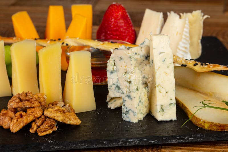 Cheese snack plate stock image. Image of party, blue - 124240341