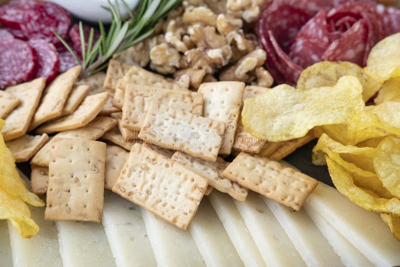 Snack Platter Featuring a Selection of Crackers, Potato Chips, Cured ...