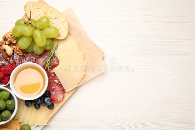 Snack Set with Delicious Parmesan Cheese on Light Wooden Table, Top ...