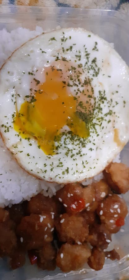 Snack with Sunny Side Up Eggs and Garlic Chicken Stock Image - Image of ...