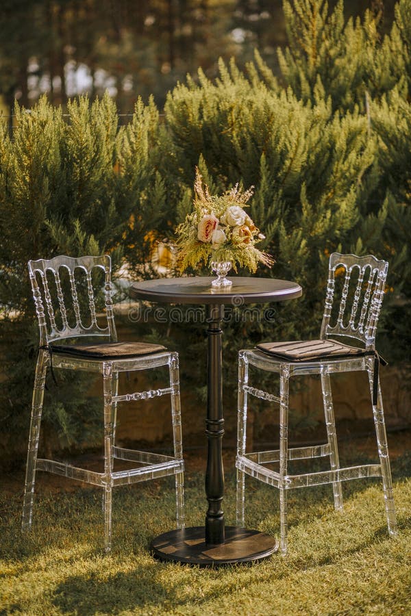 Snack table and chairs stock image. Image of garden - 146764835