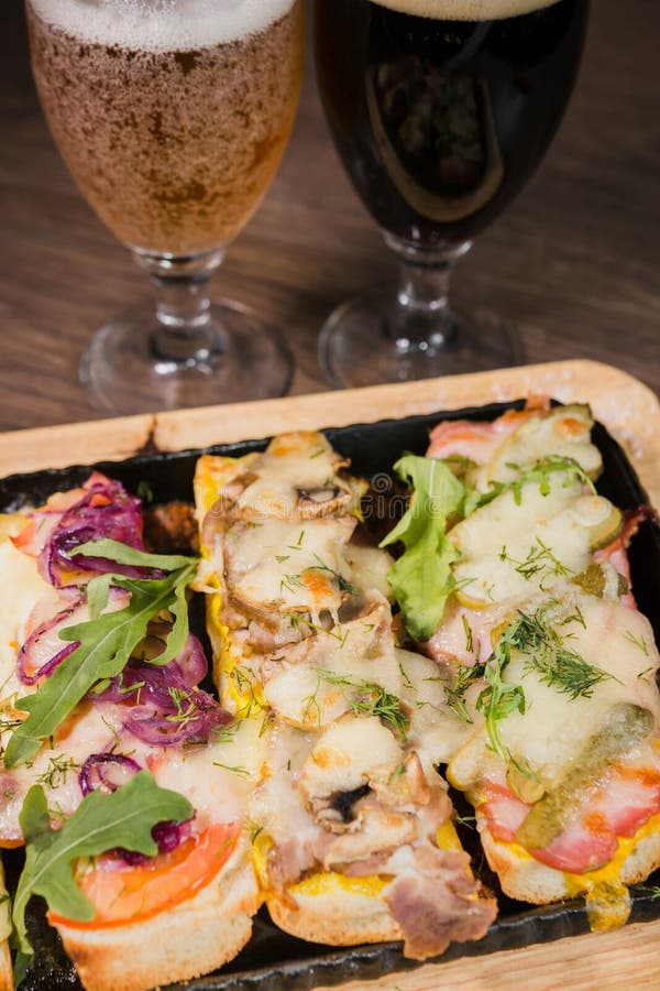 Snack To Beer in the Form of Sandwiches with Meat Stock Photo - Image ...