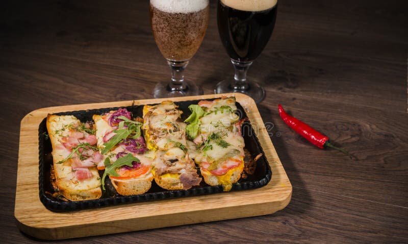 Snack To Beer in the Form of Sandwiches with Meat Stock Photo - Image ...