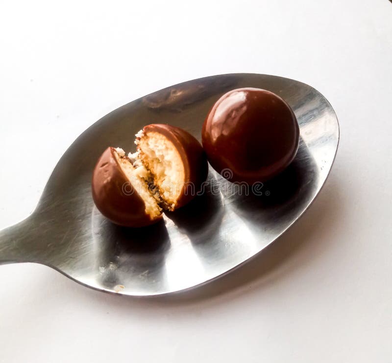 Snacking on chocolate stock image. Image of appetite - 30565657