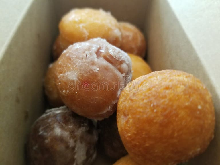Snacking on 10 Different Kinds of Timbits Stock Photo - Image of ...