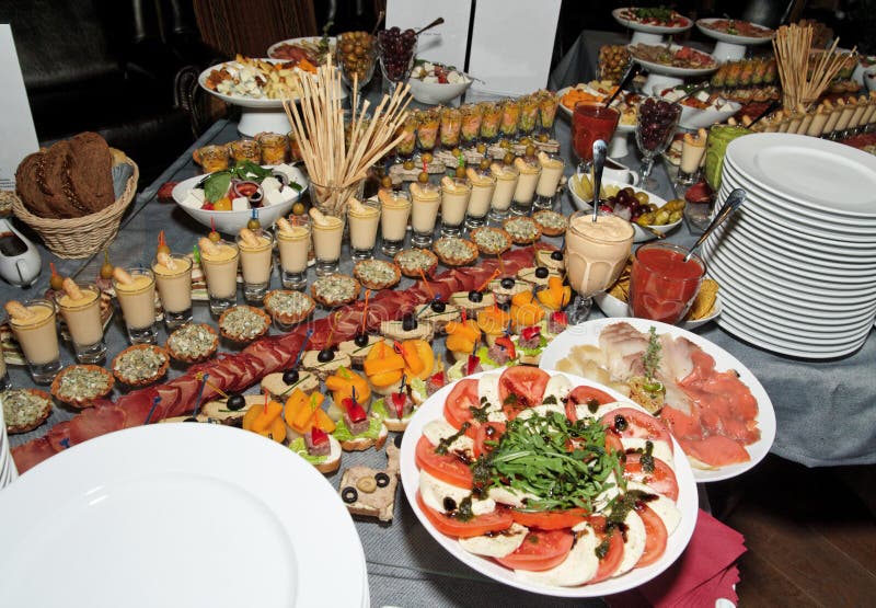 Loaded Banquet Table Stock Photos - Free & Royalty-Free Stock Photos ...