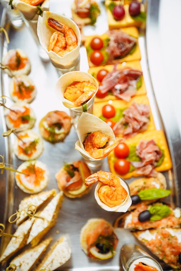 Snacks on the buffet table stock image. Image of holiday - 138283649
