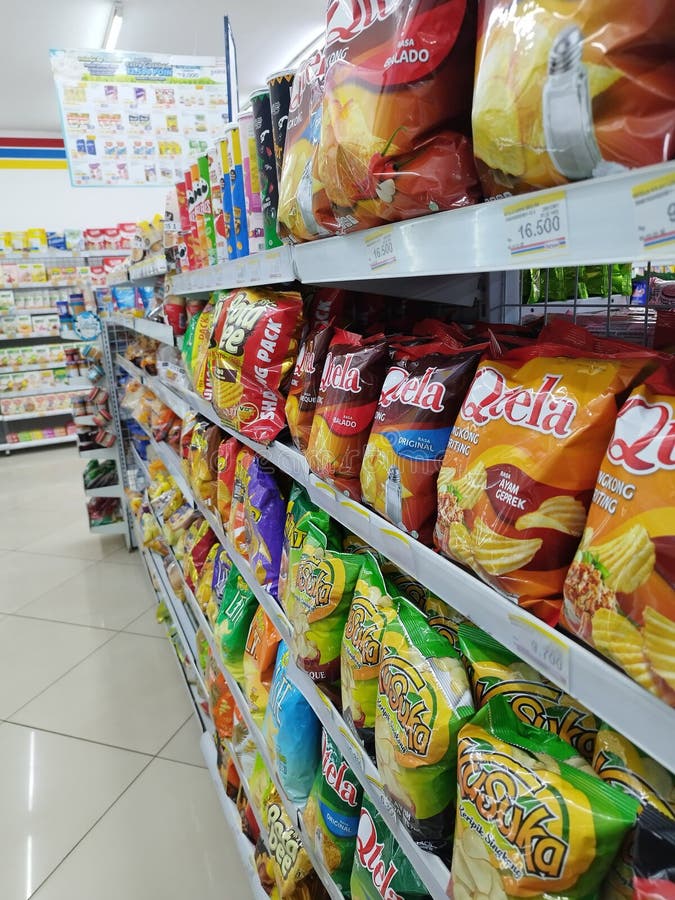 Snacks in a mini market editorial photo. Image of retail - 266630666