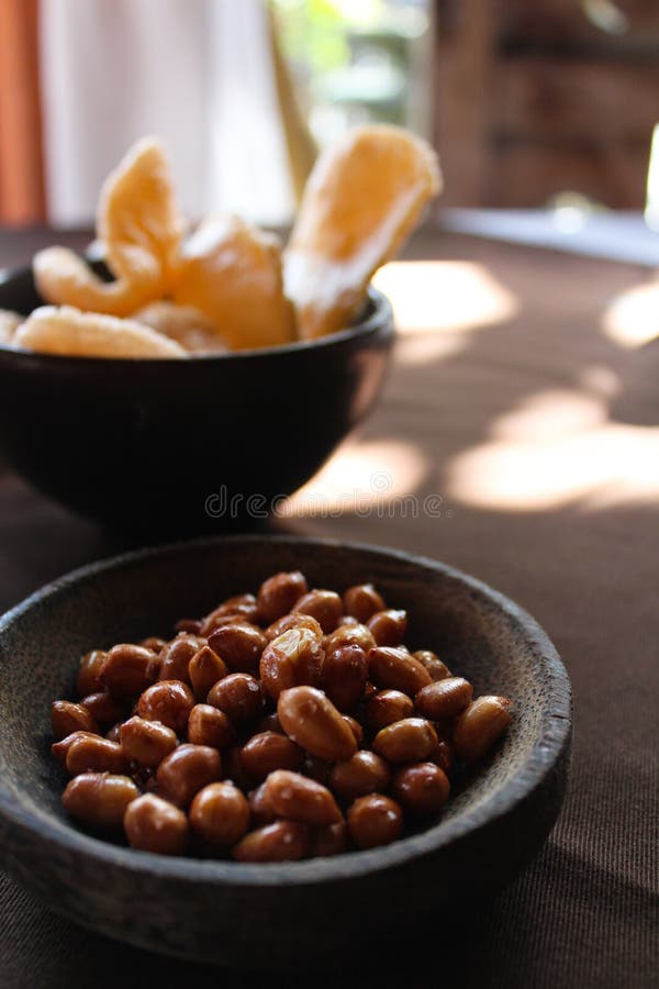 Snacks: Peanuts and chips stock image. Image of peanut - 39050767