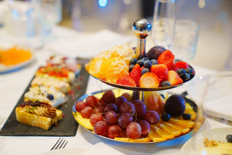 Snacks and and a Plate and Fruit Platter on the Table. Catering Stock ...