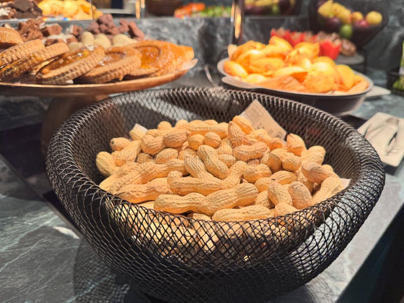 Snacks Set Out in a Lounge for Customers, Including Peanuts and Sweet ...