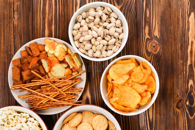 Snacks on a Wooden Background. Stock Photo - Image of assortment, snack ...