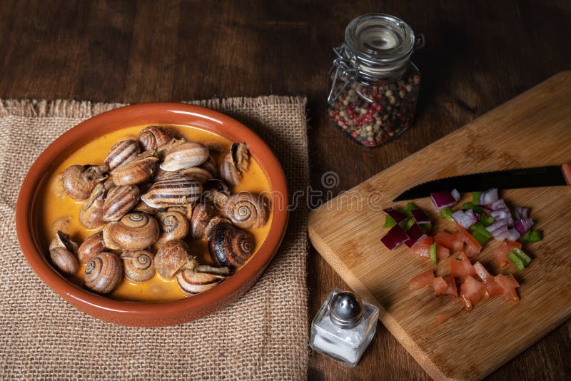 Snail stew stock photo. Image of prepared, stew, ingredients - 241865720