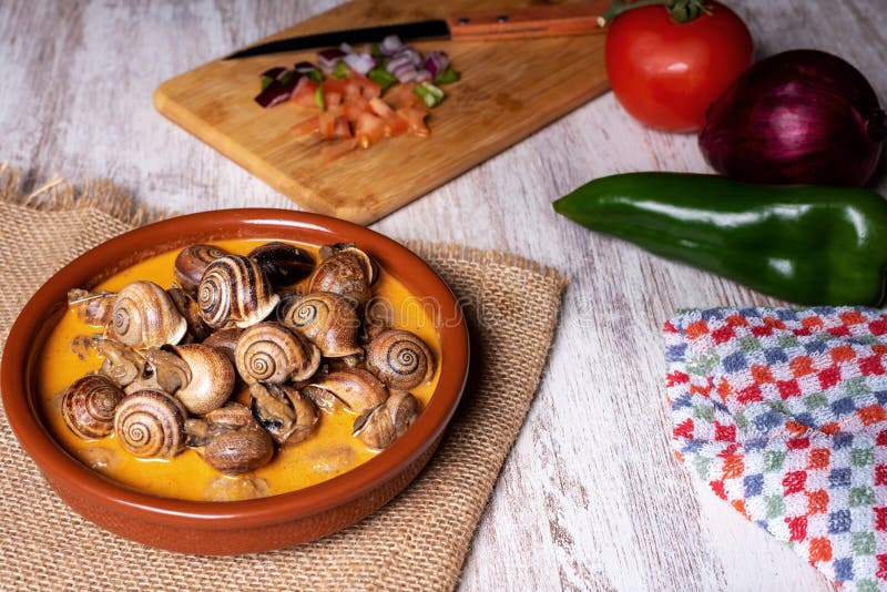 Snail stew stock photo. Image of saute, table, kitchen - 241865740