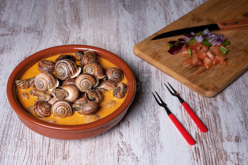 Snail stew stock image. Image of healthy, saute, kitchen - 241865741
