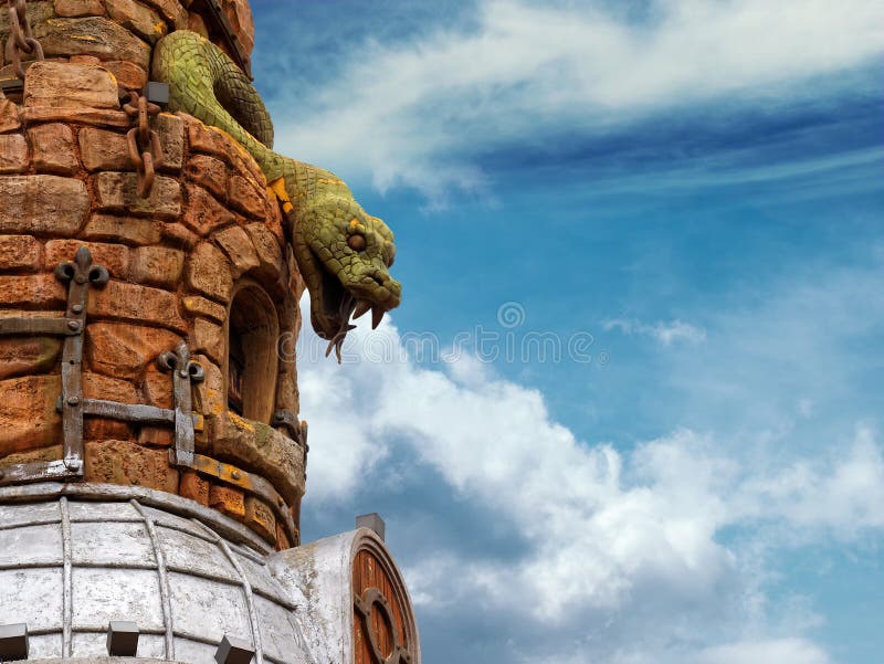 Snake drake clinging tower editorial photo. Image of spooky - 99914736