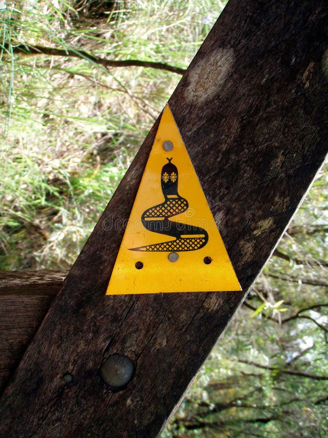 Snake Warning Sign at a Park Stock Photo - Image of nature, park: 121110440