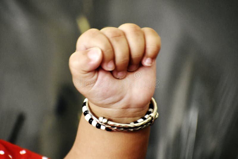 Snap of hand of a baby stock image. Image of black, jewelry - 223929969