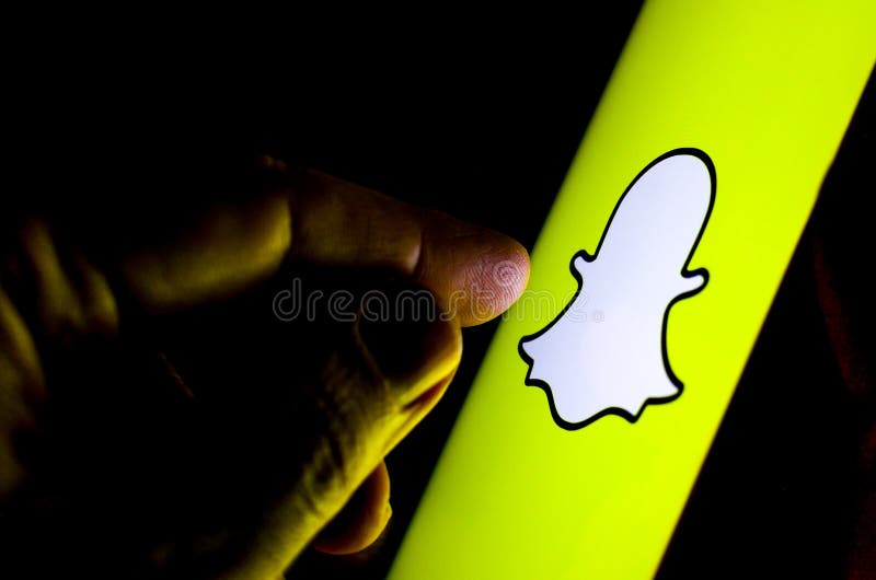 Snapchat App Icon on the Smartphone Screen with Visible Pixels and the ...
