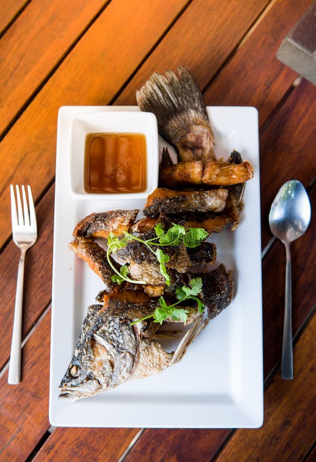 Snapper Fish Fried with Fish Sauce,Top View Stock Photo - Image of ...