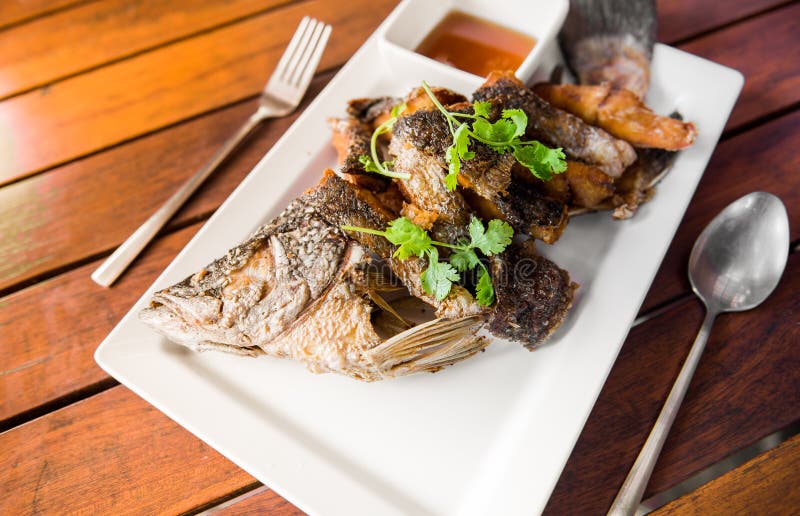 Snapper Fish Fried with Fish Sauce,Top View Stock Photo - Image of ...