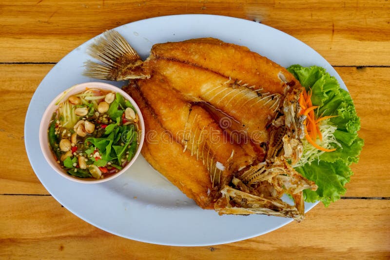 Snapper Topped with Sauce on a White Plate Stock Image - Image of ...