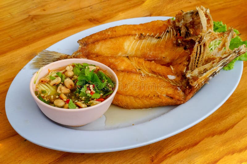 Snapper Topped with Sauce on a White Plate Stock Photo - Image of fish ...