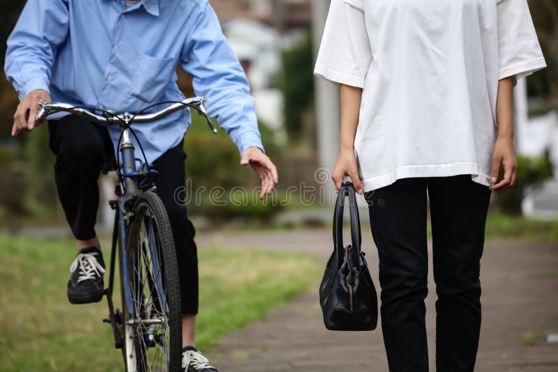 Snatching the Use of a Bicycle Stock Image - Image of face, cash: 245196255