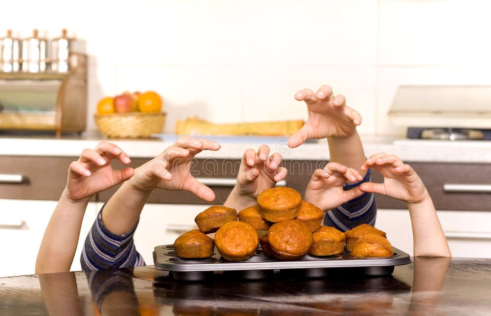 Sneaking cookies stock photo. Image of baking, eating - 22763482