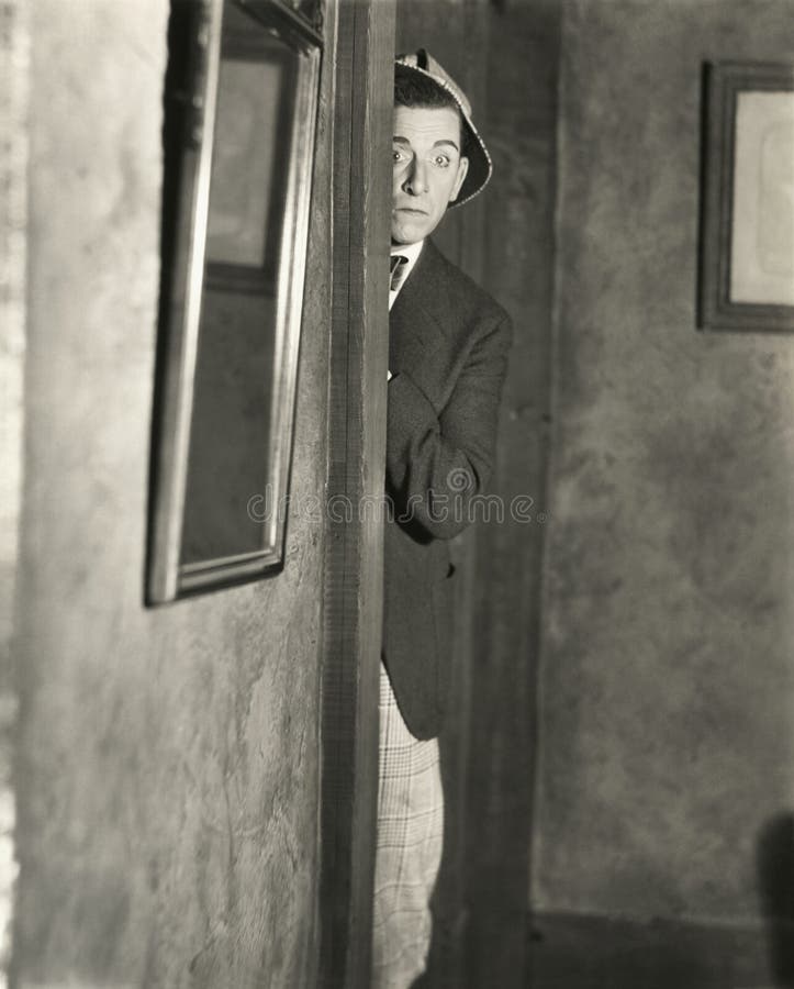 Man Sneaking Into House From Doorway. Stock Image - Image of security ...