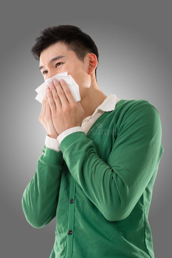 Sneezing asian man stock image. Image of healthcare, portrait - 76698927