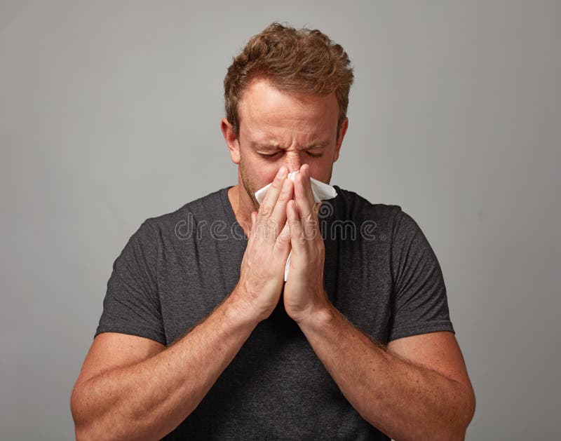 Sneezing man with cold stock image. Image of headache - 80983507