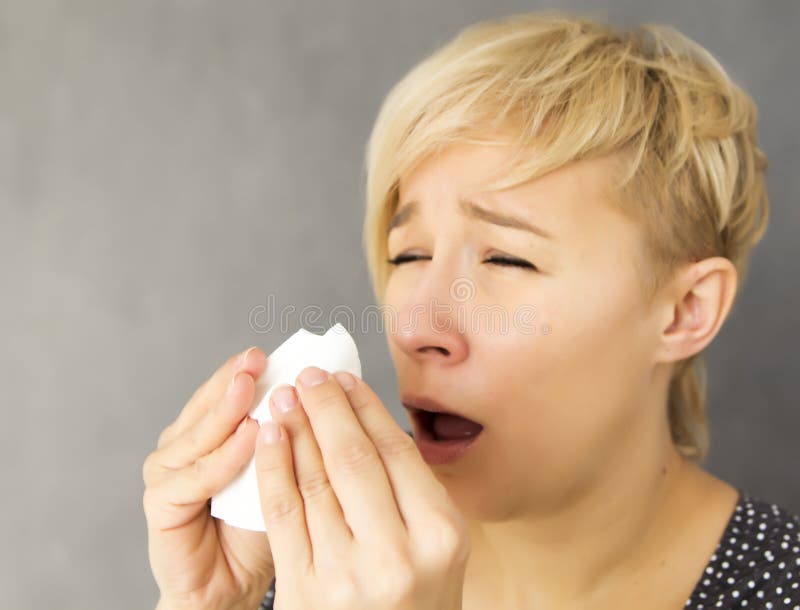 Sneezing woman stock image. Image of autumn, nose, tissue - 38468175