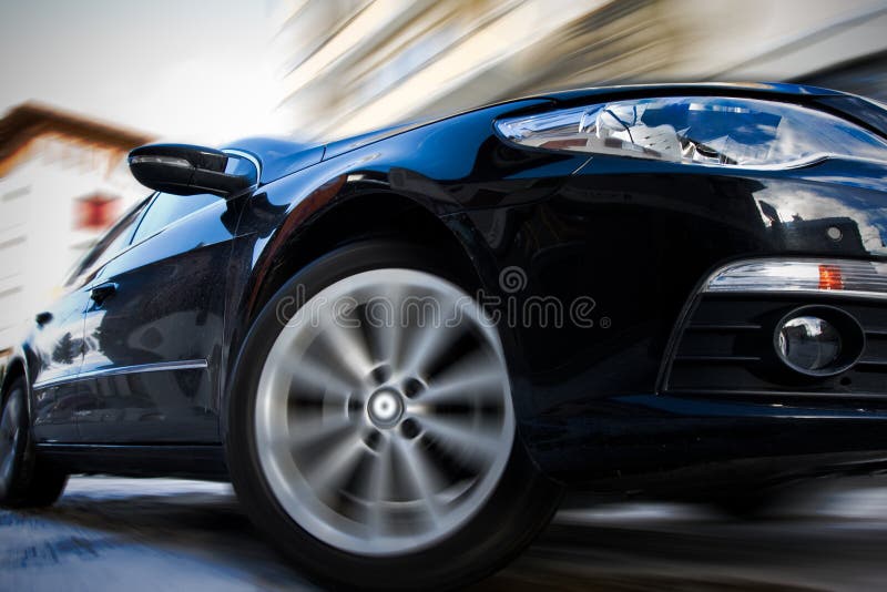 Snel bewegende auto stock foto. Image of auto, stad, ontwerp - 7800680